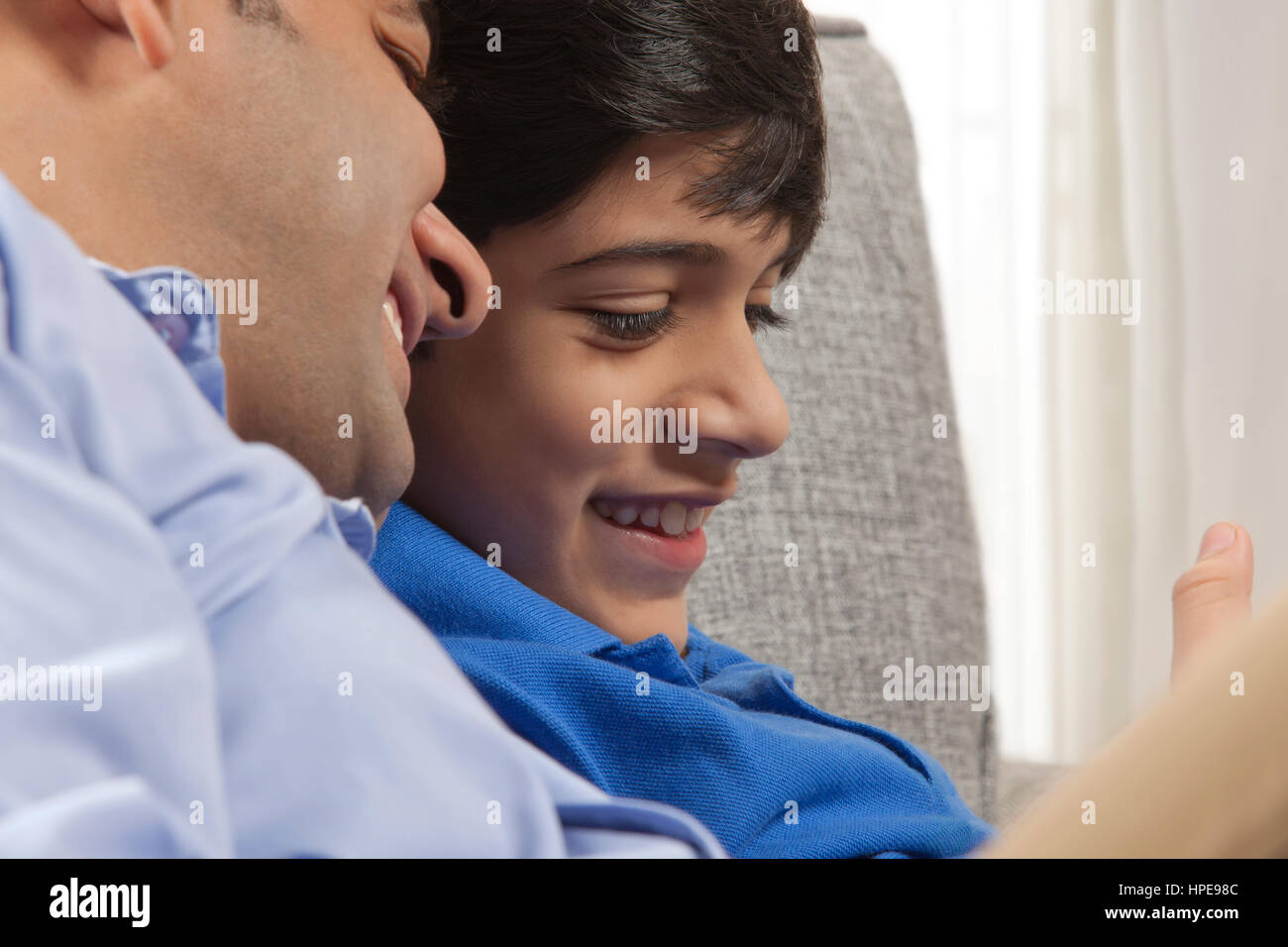 Father son mobile phone hi-res stock photography and images - Alamy