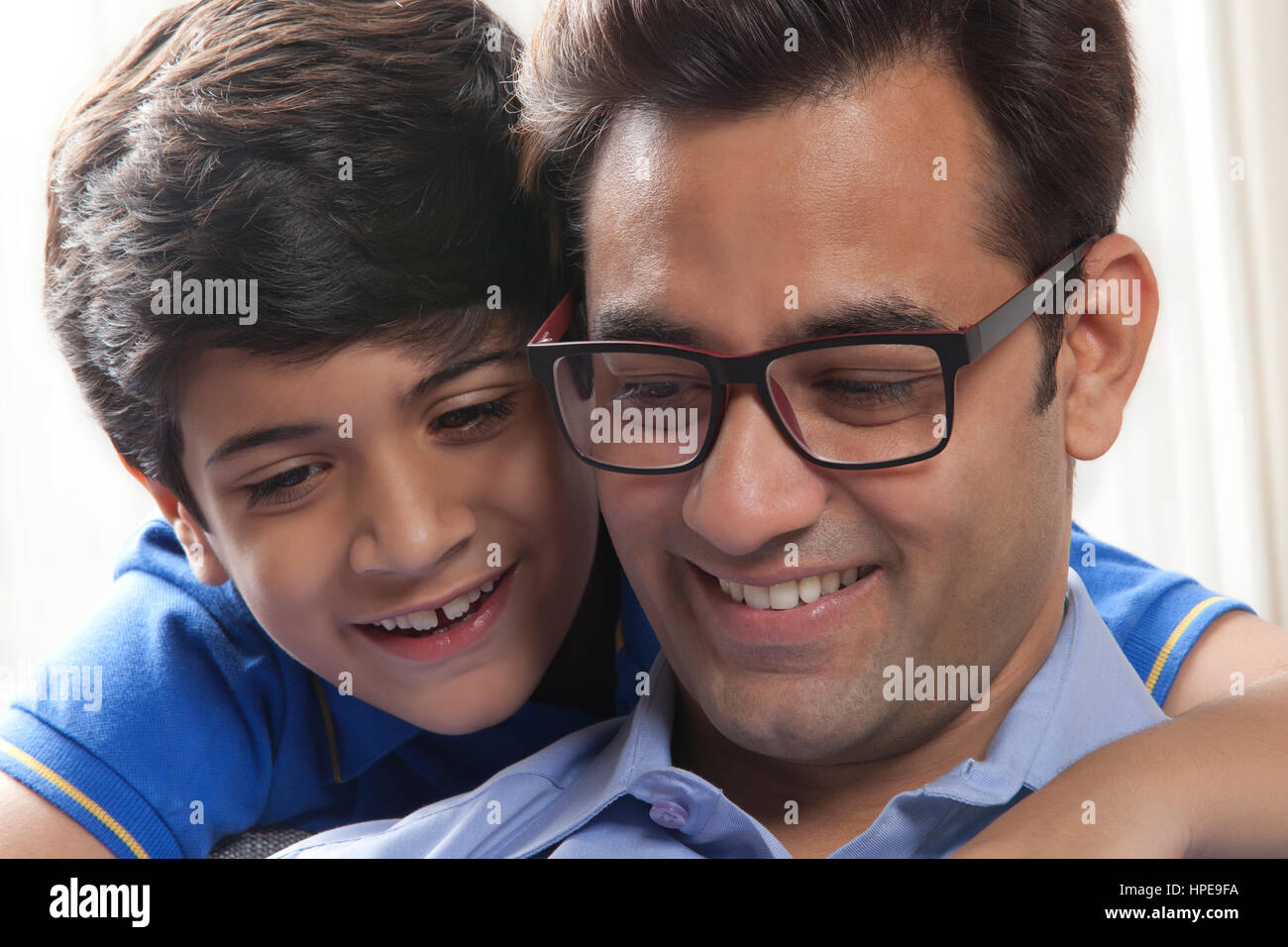 Indian father and son hi-res stock photography and images - Alamy
