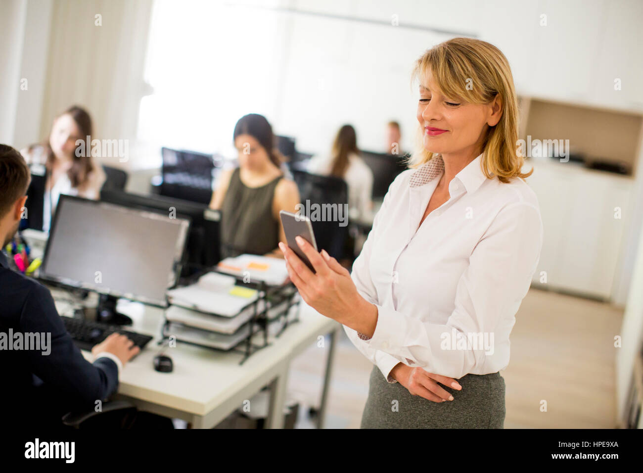 Young people working in the modern office Stock Photo - Alamy