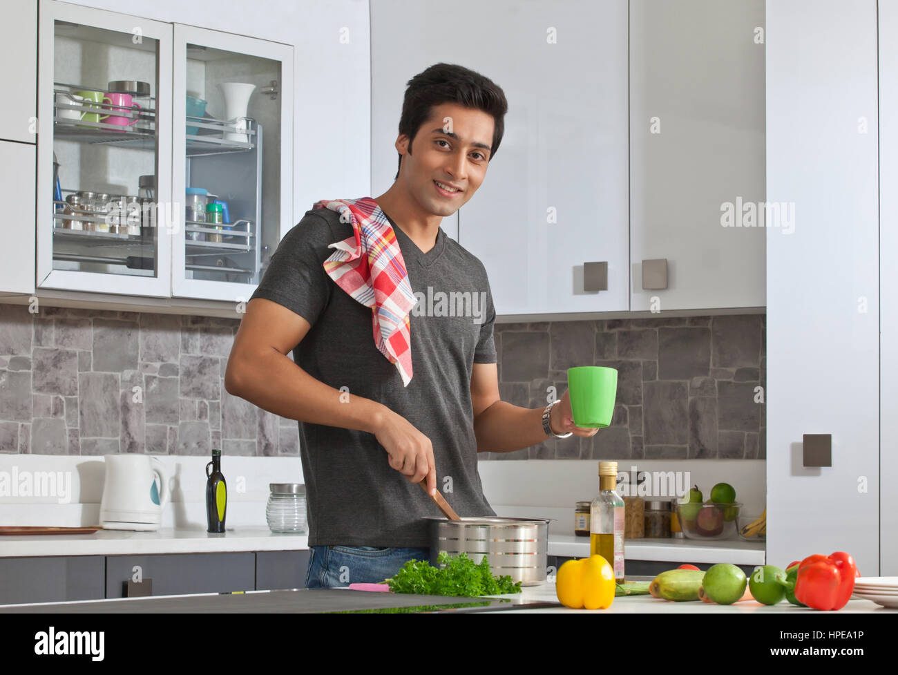 Asian man cooking hi-res stock photography and images - Alamy
