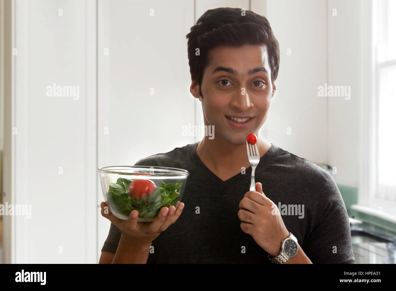 Indian man eating hi-res stock photography and images - Alamy