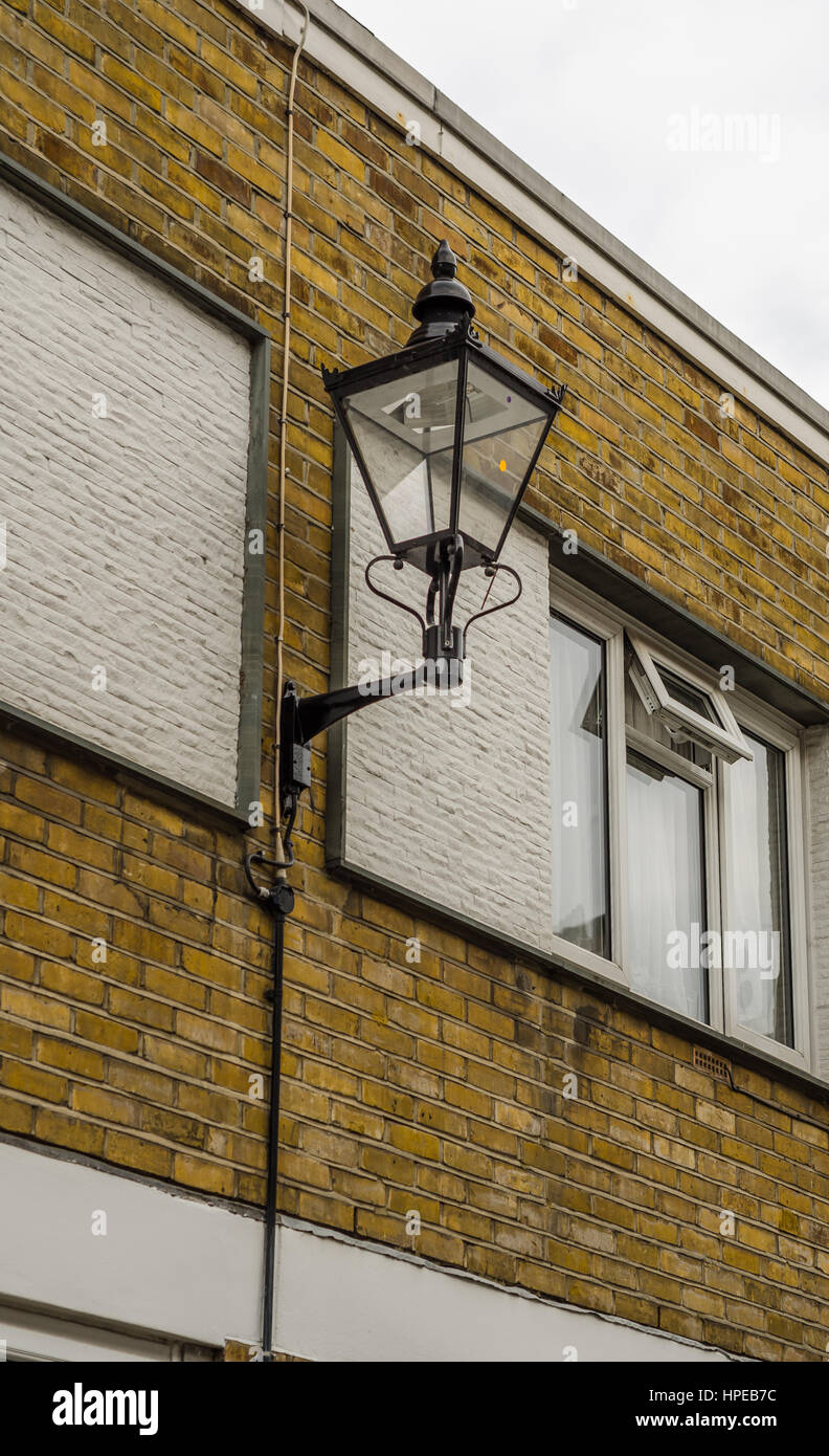 street lamp stylized at the old gas lamp, the lamp placed on the facade ...