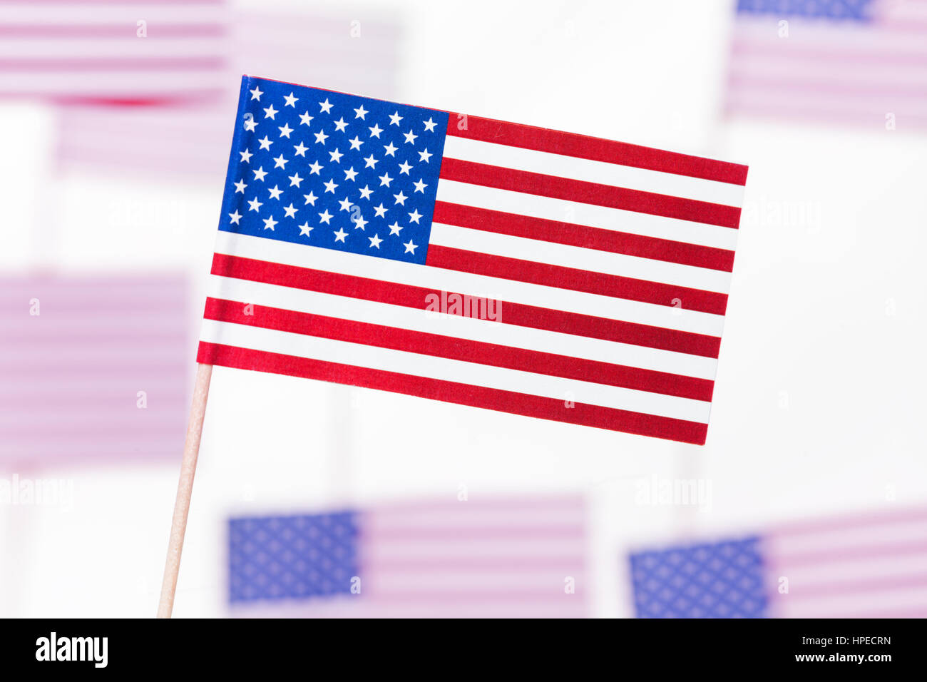 Small paper flag of United States of America with flagpole Stock Photo ...