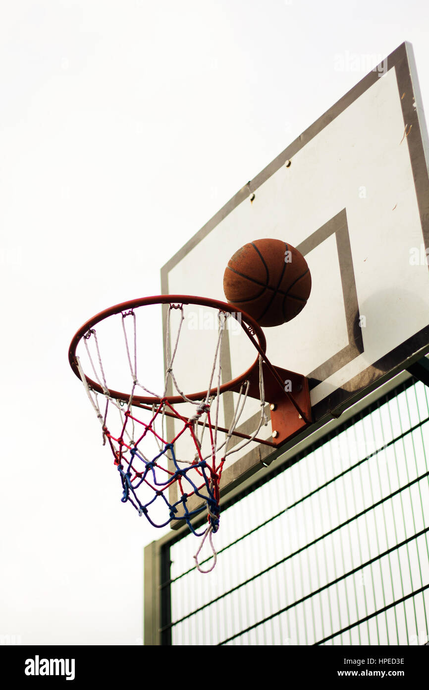 Basketball hoop outside in a school play area Stock Photo - Alamy