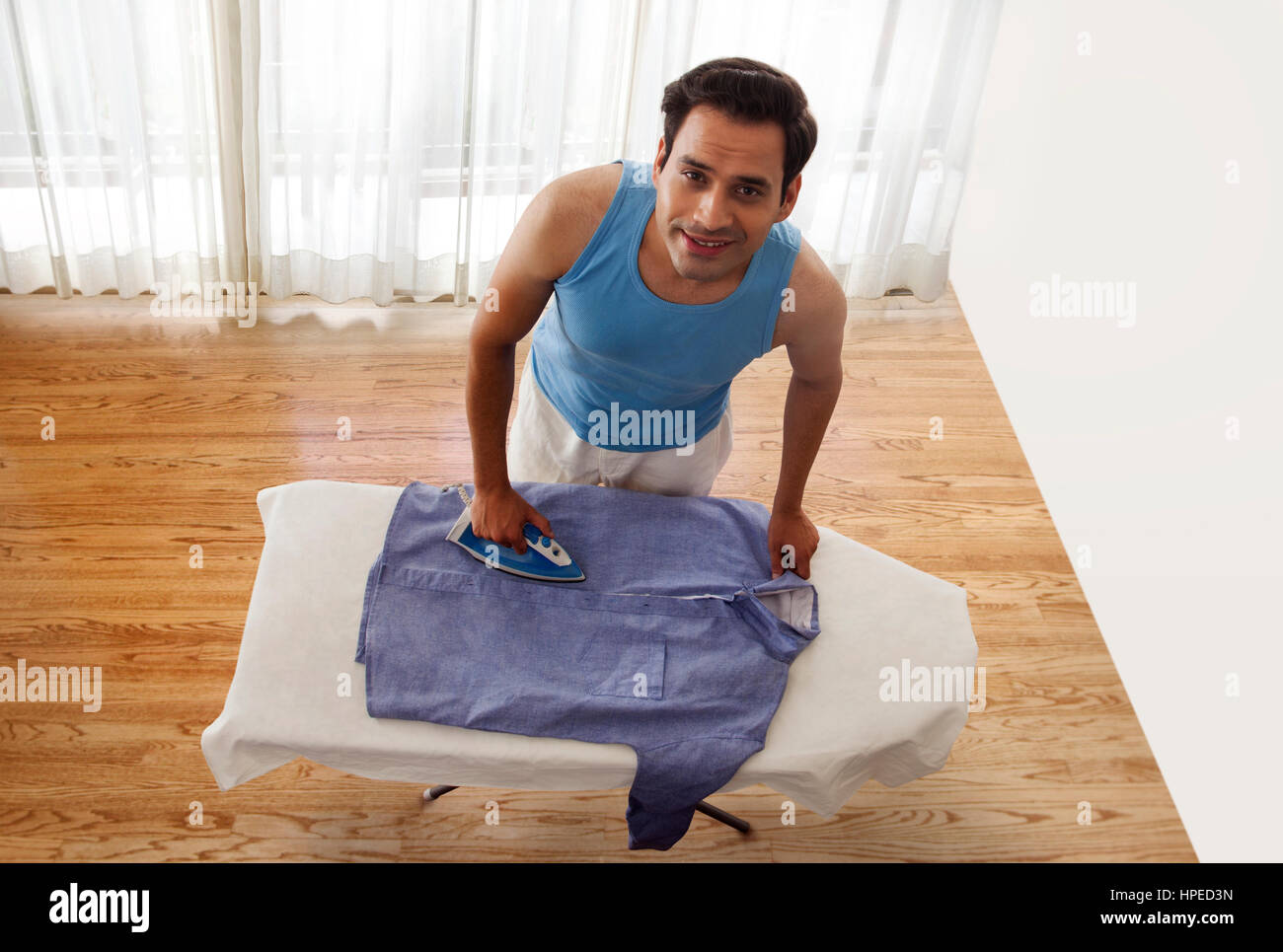 Indian ironing man hi-res stock photography and images - Alamy