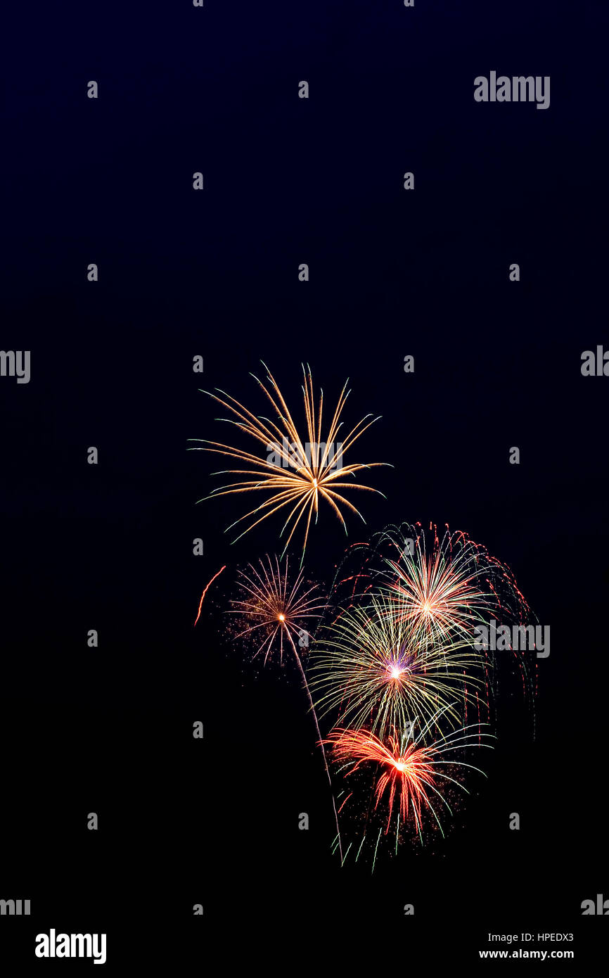 Colorful fireworks on a clear night Stock Photo - Alamy