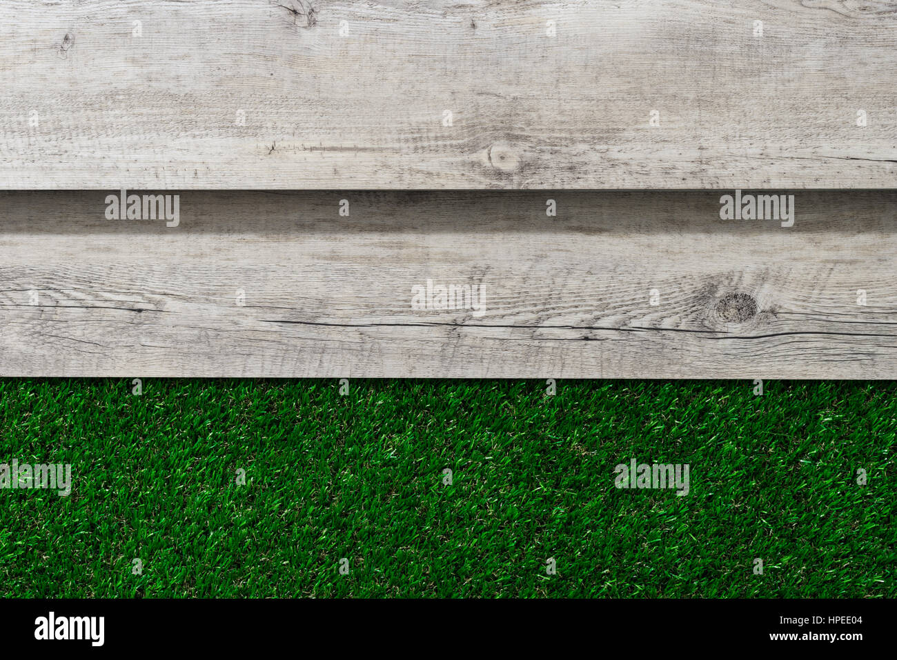 Rustic wooden table and lush garden grass, environment and nature ...