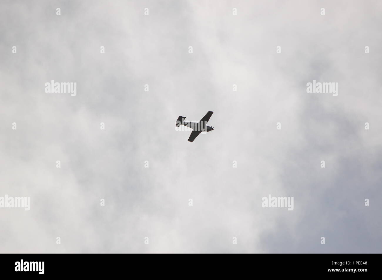 plane flying above Stock Photo - Alamy