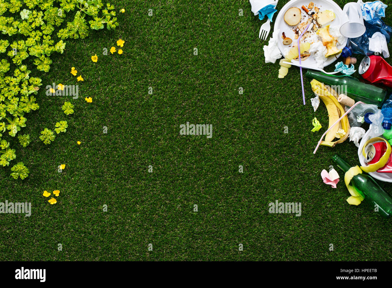 Environment and waste concept banner: green lush grass on the left and ...