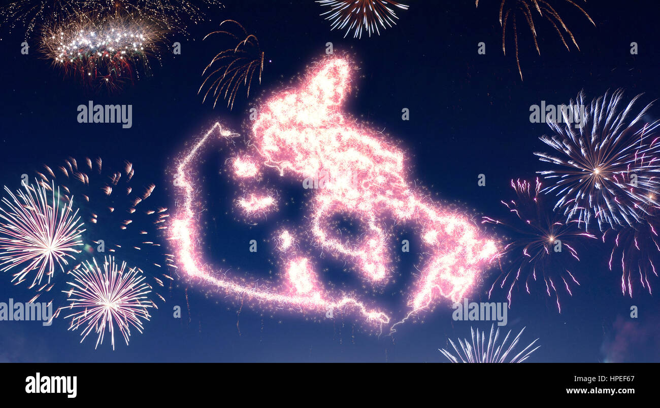 A dark night sky with a sparkling red firecracker in the shape of ...