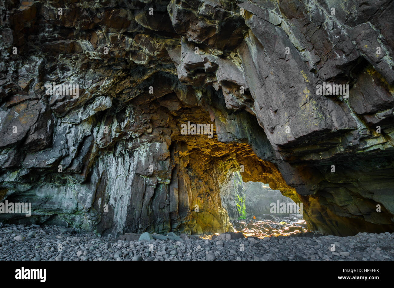 Carsaig Arches rocks formation with cave inside, Isle of Mull, Scotland ...