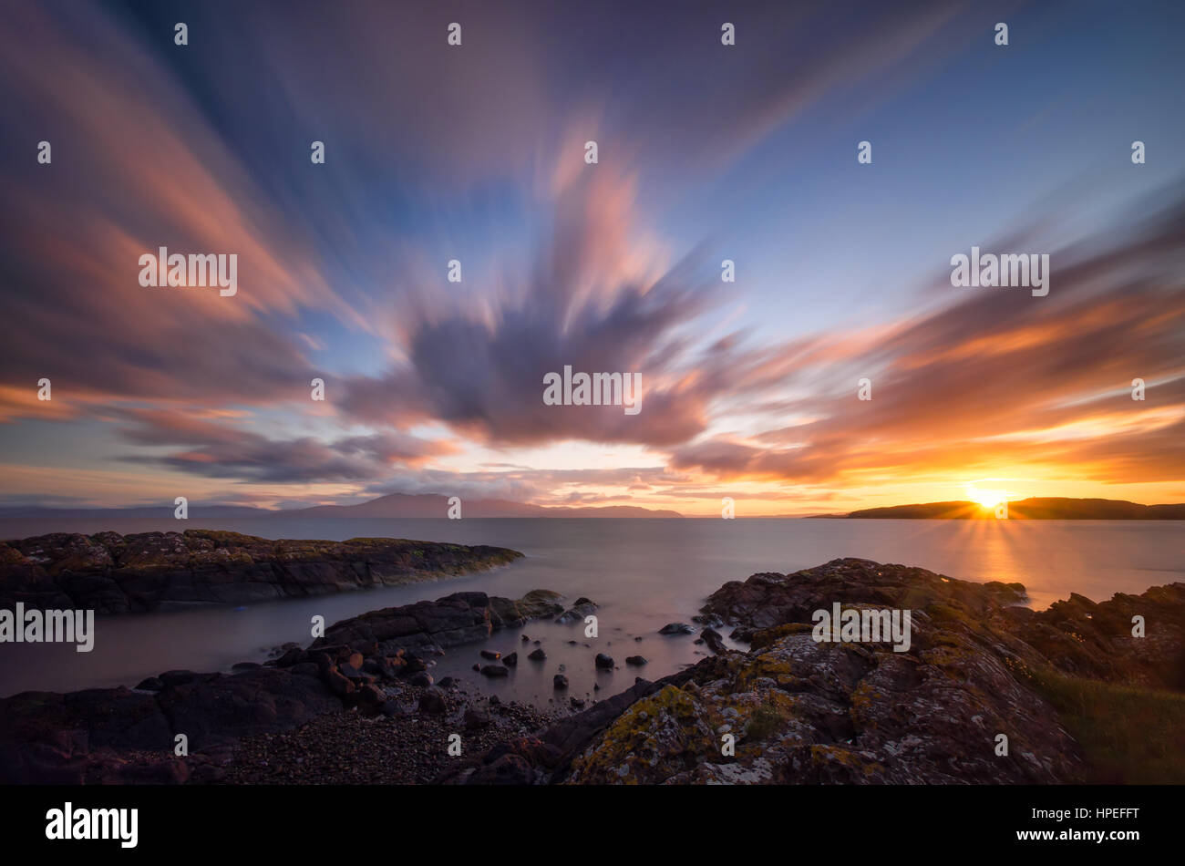 Ardneil Bay with distant Isle of Arran in colorful sunset, Highlands ...