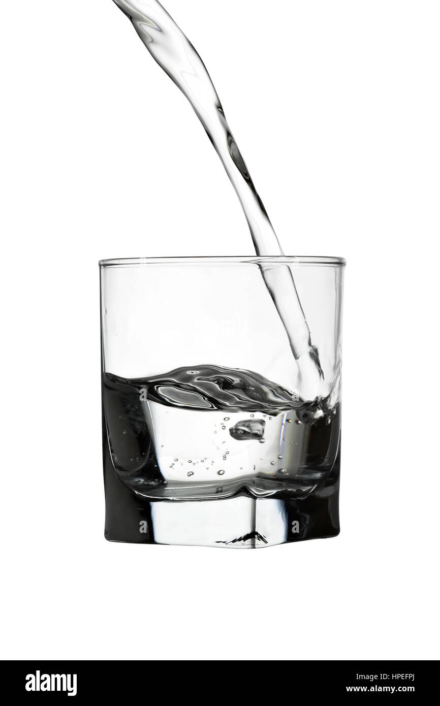 Water pouring into transparent glass isolated on white Stock Photo - Alamy