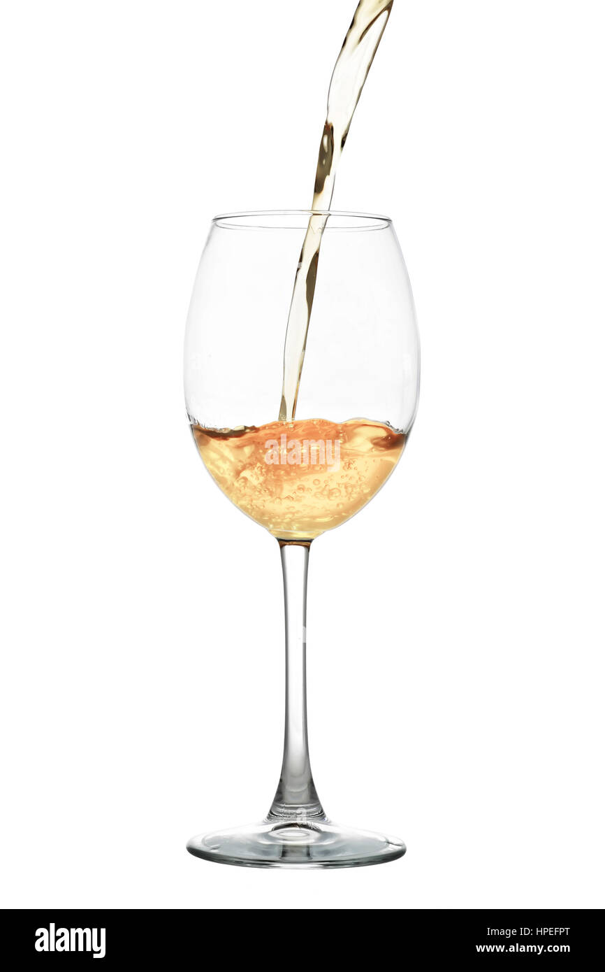 White wine flowing into a glass isolated on white background Stock ...