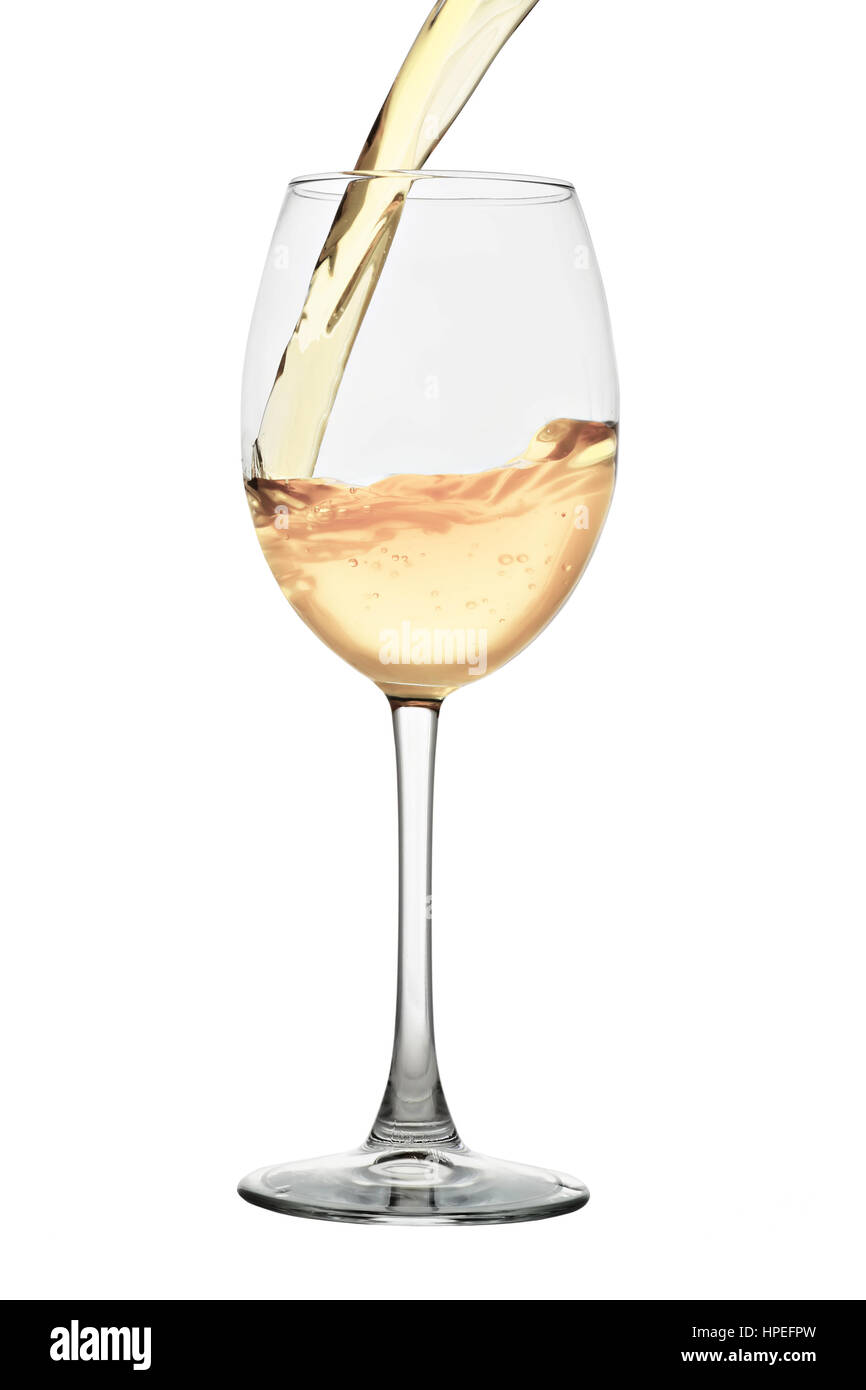 White wine pouring into a glass isolated on white background Stock ...