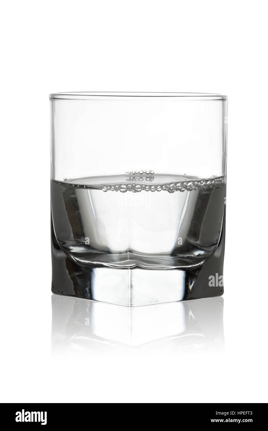 Water in a glass with its reflection isolated on white background Stock ...