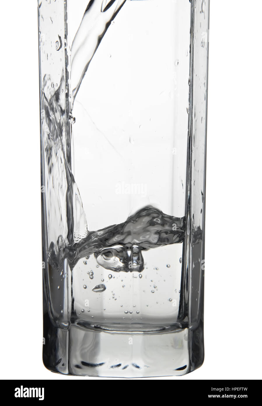 Water flowing into a glass closeup view isolated on white Stock Photo ...