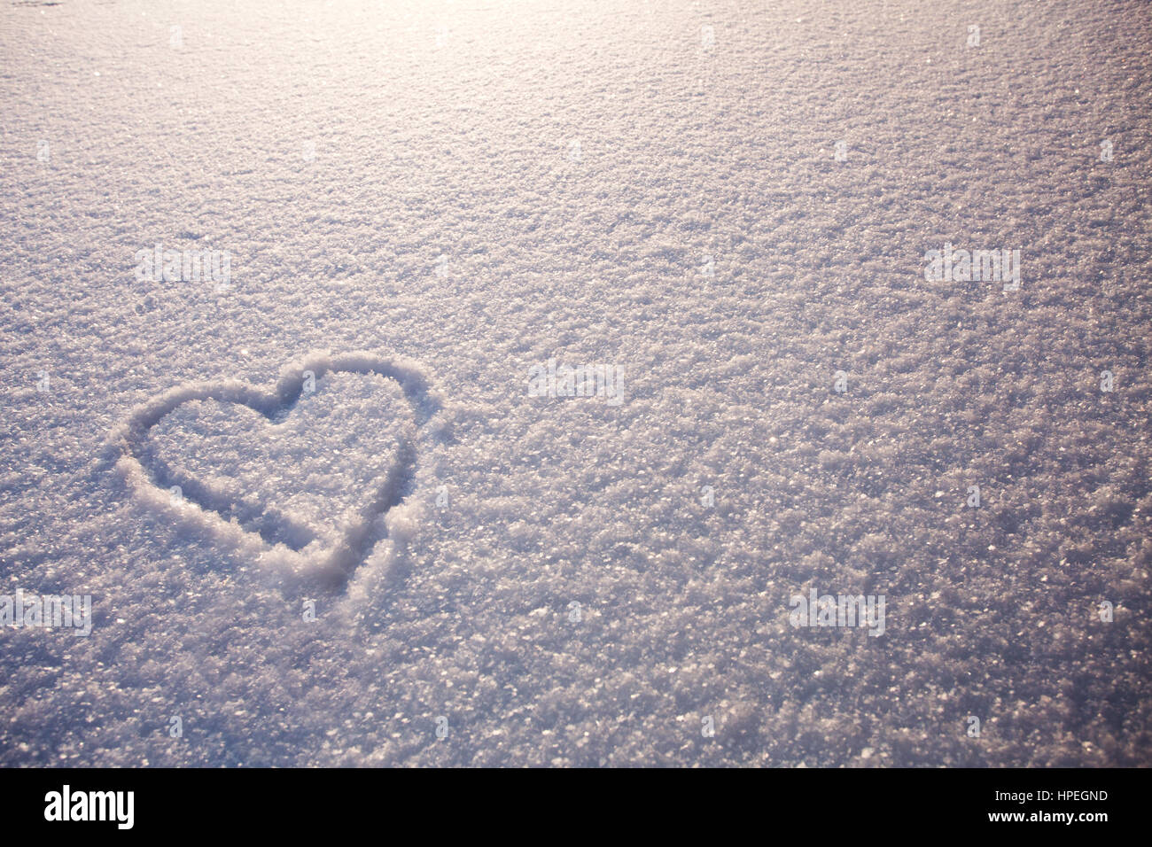 One heart on snow hi-res stock photography and images - Alamy