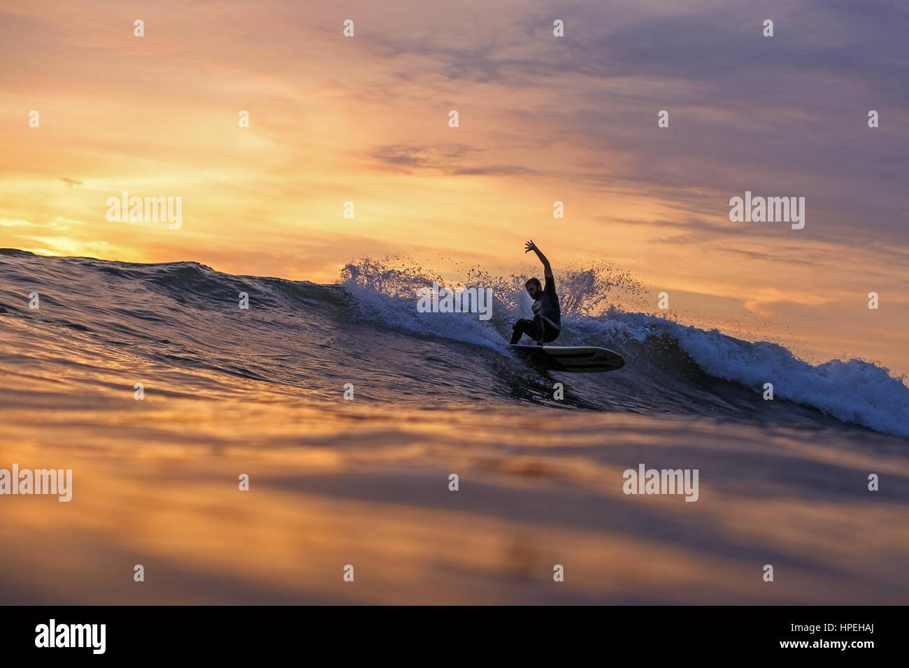Inside wave sunset hi-res stock photography and images - Alamy