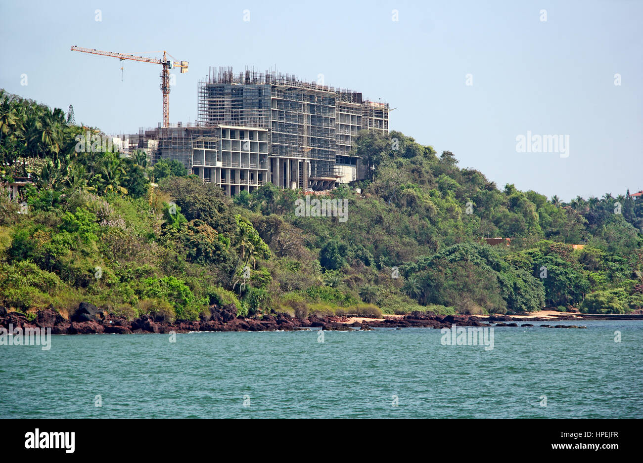 Construction of high rise sea facing apartment buildings on a hillock ...