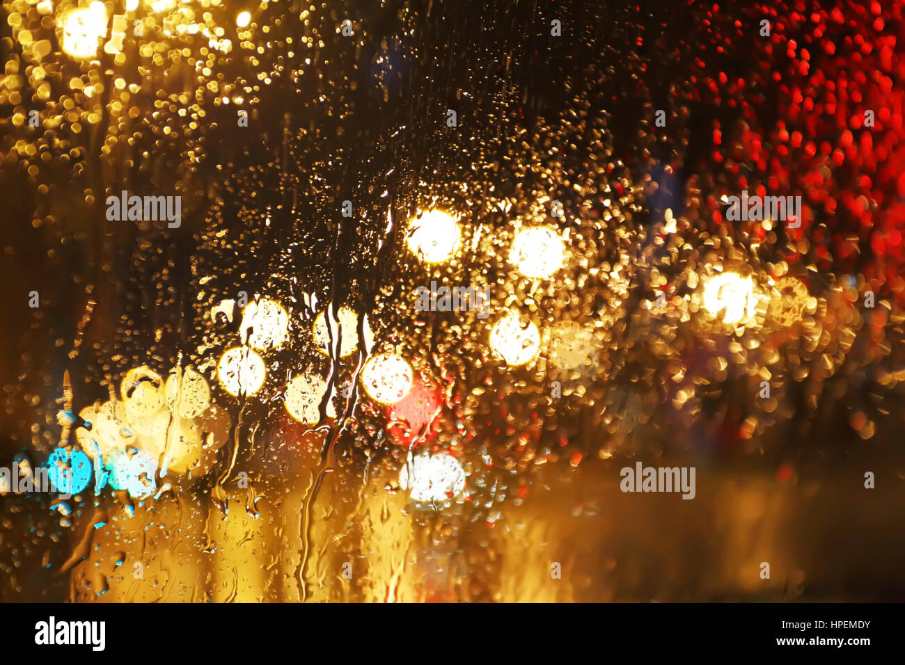 Blurred rain background view through wet car window Stock Photo - Alamy