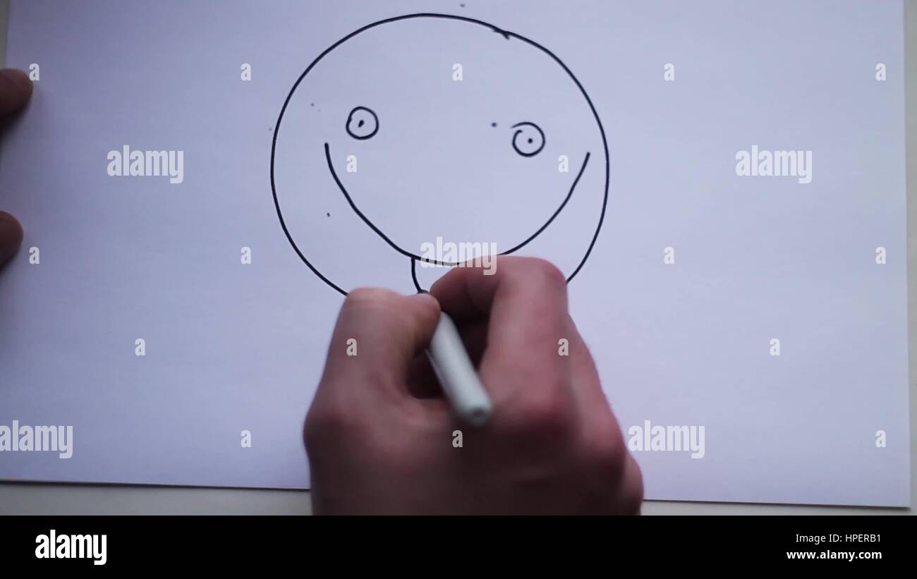 Hand man draws smiley face hi-res stock photography and images - Alamy