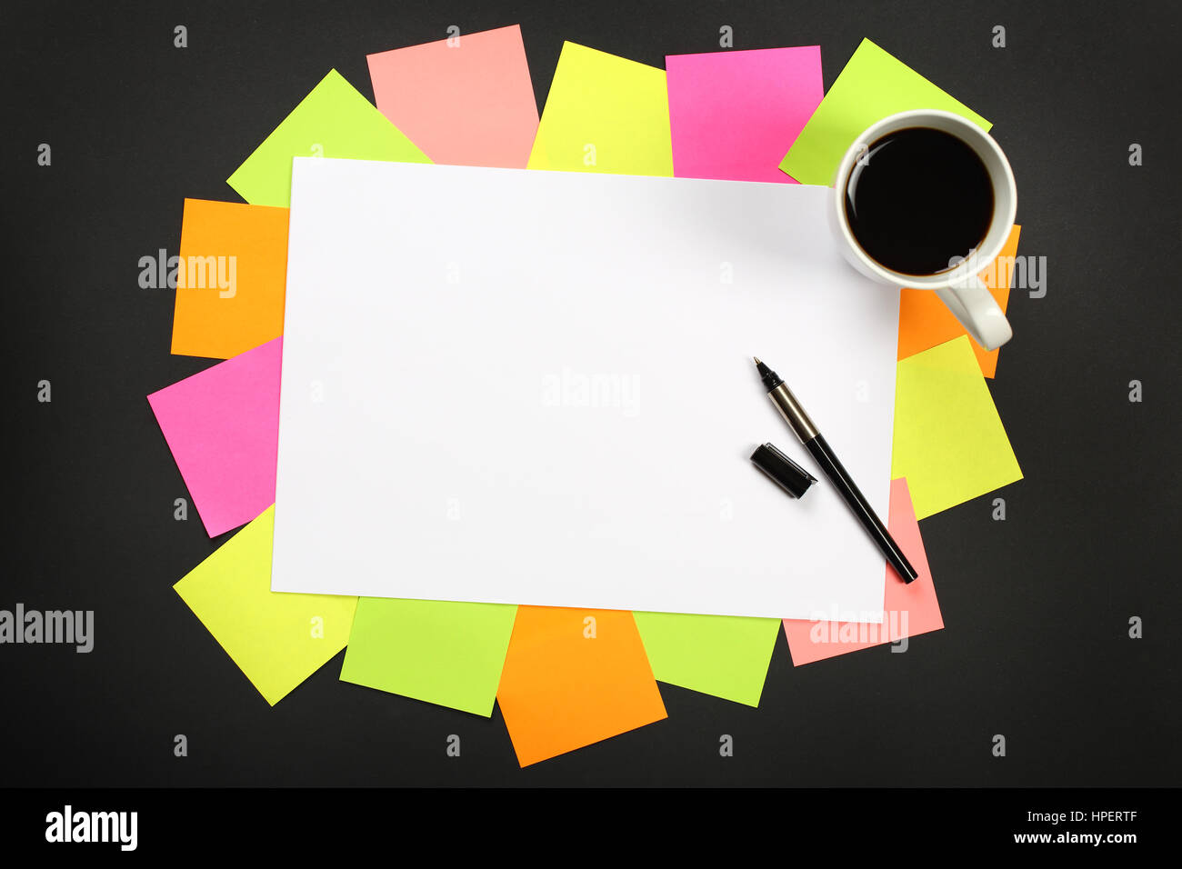 Blank sheet of paper, yellow sticky notes and pen on office desk Stock ...