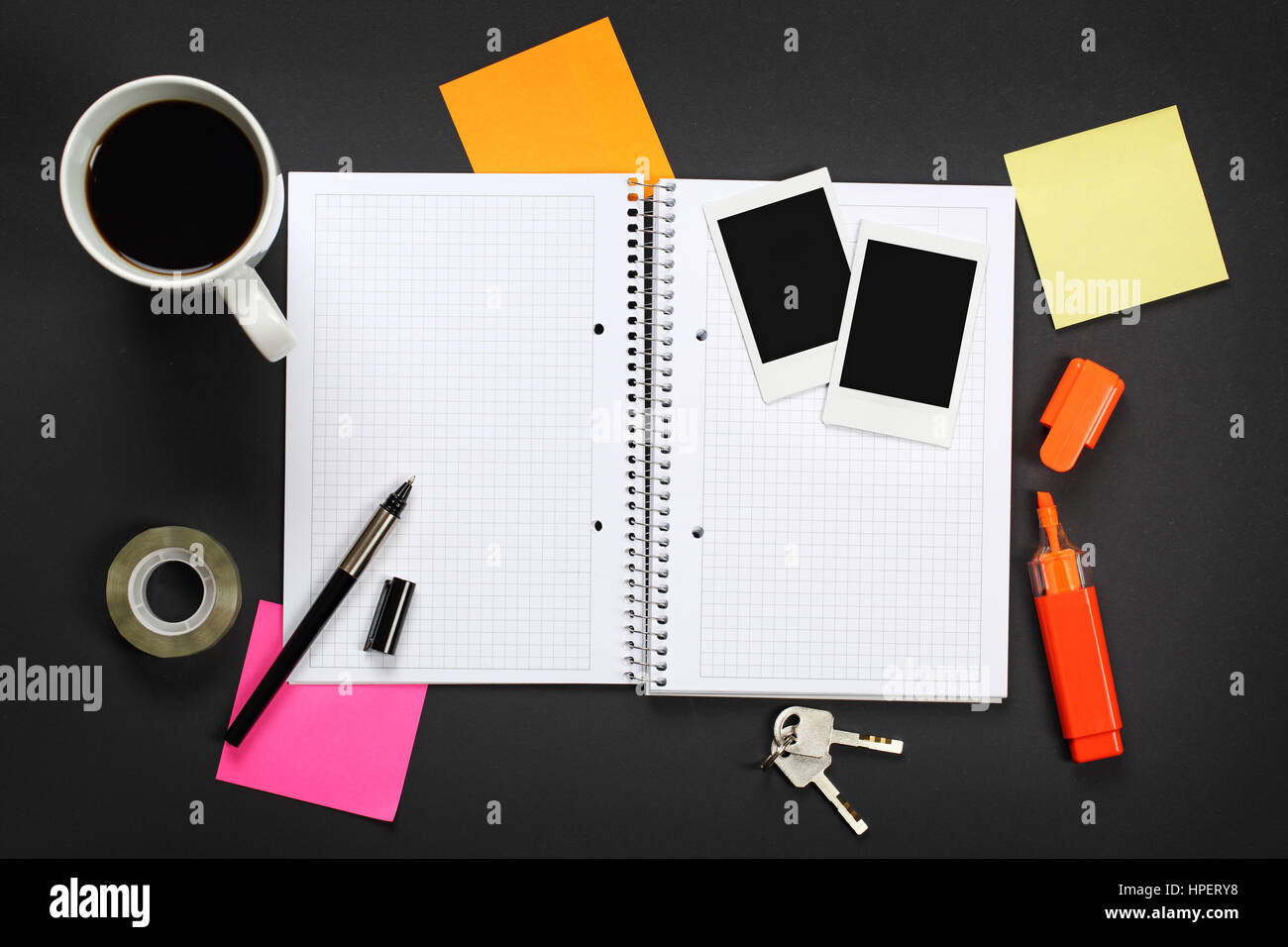 Blank sheet of paper, yellow sticky notes and pen on bright wooden ...