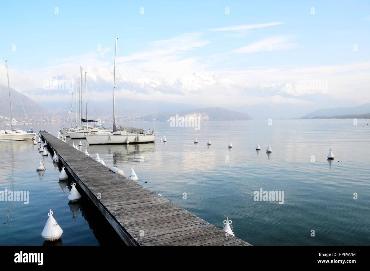 Annecy lake and snow on mountains landscape, winter, france Stock Photo ...