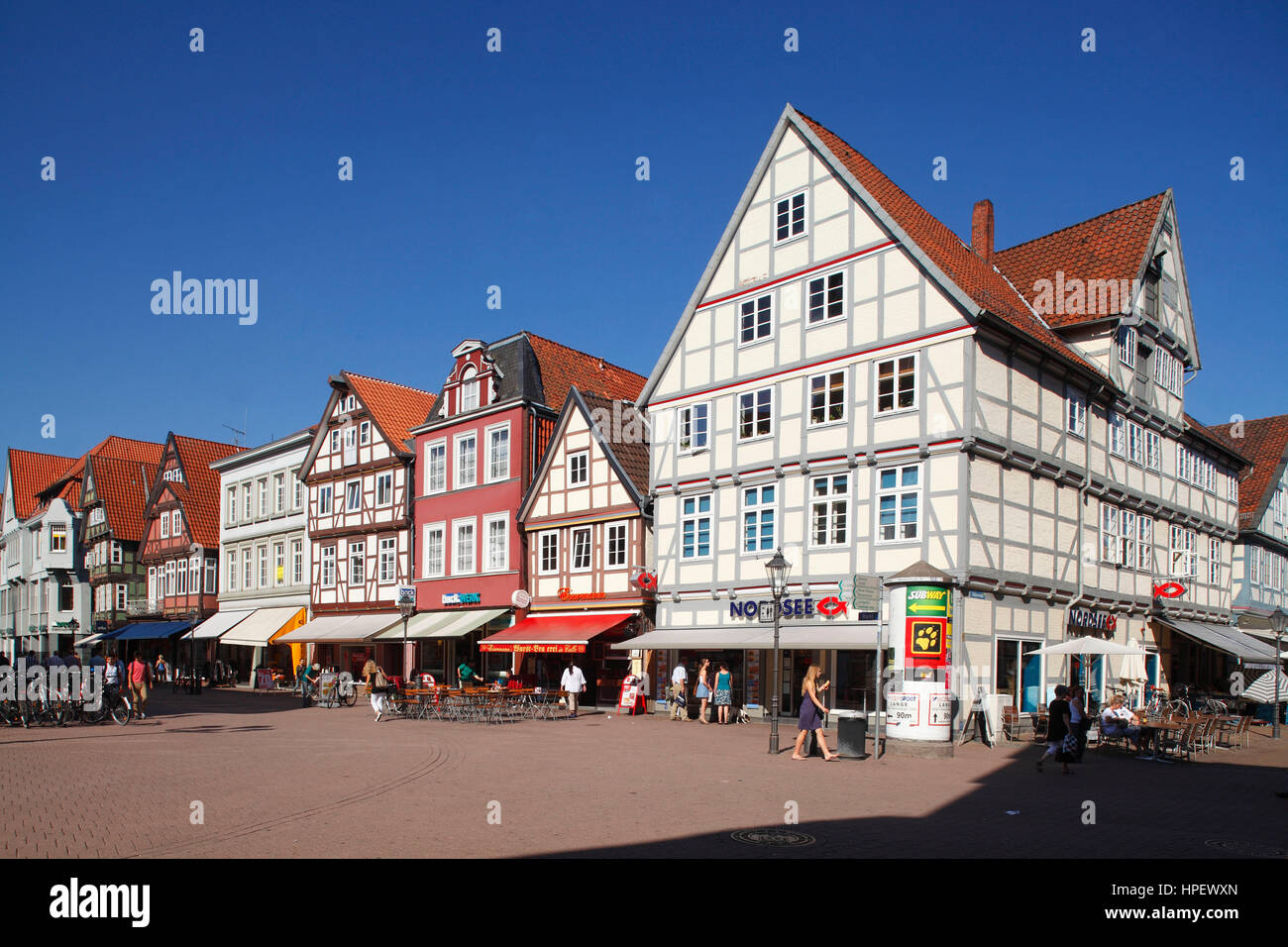 Half-timbered houses with outdoor seating on the market square, old ...