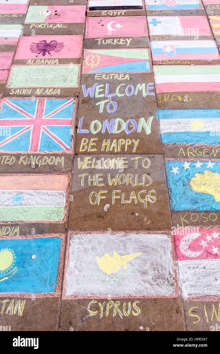 with chalk drawn flags of different countries on sidewalk tiles Stock ...