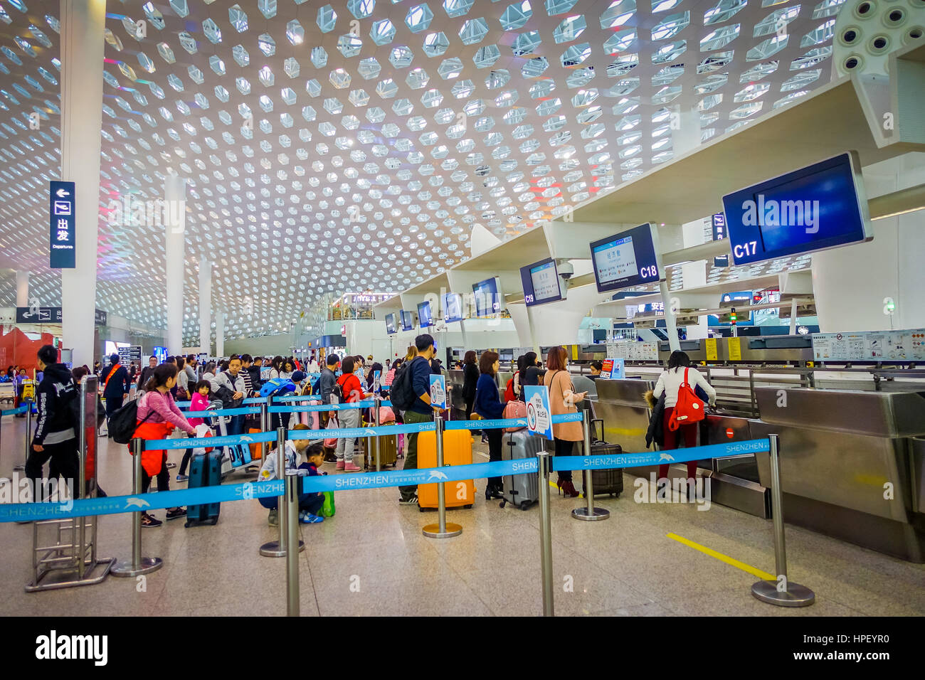 SHENZEN, CHINA - 29 JANUARY, 2017: Inside airport terminal hall, modern ...