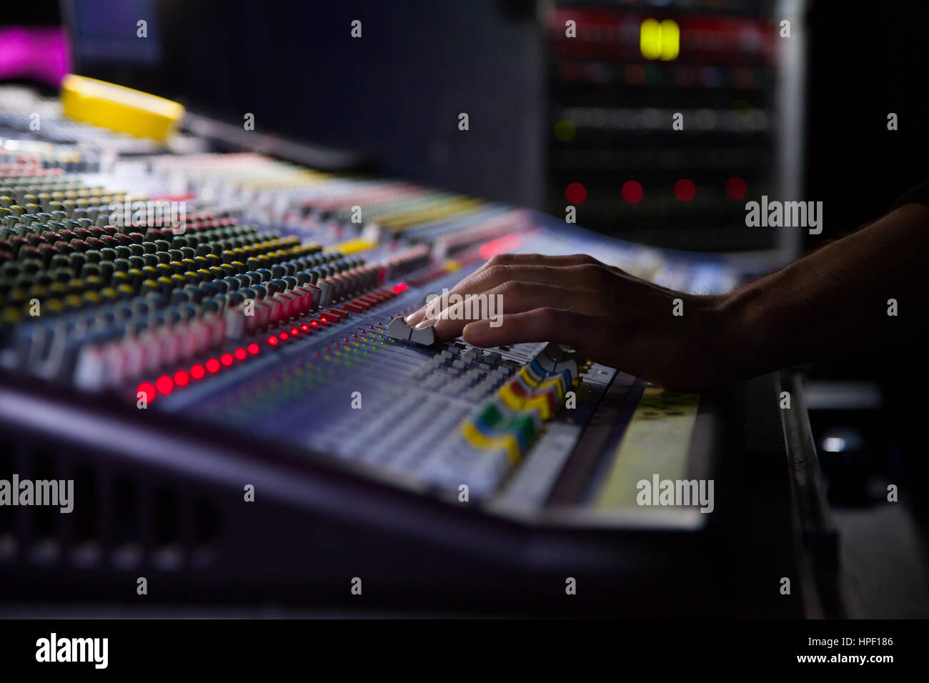 Mixing board hands hi-res stock photography and images - Alamy