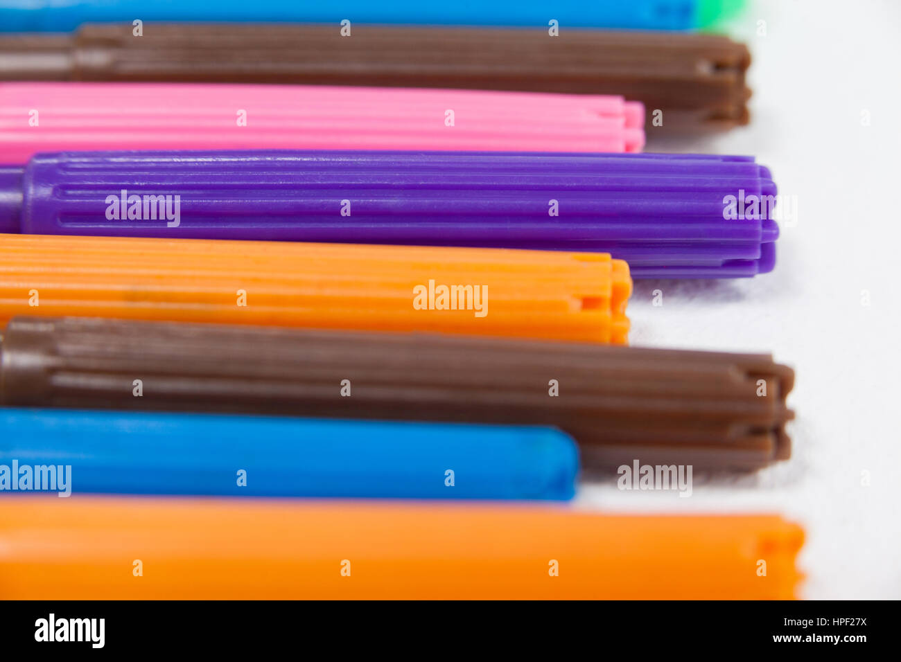Close up of sketch pens arranged in a row Stock Photo - Alamy