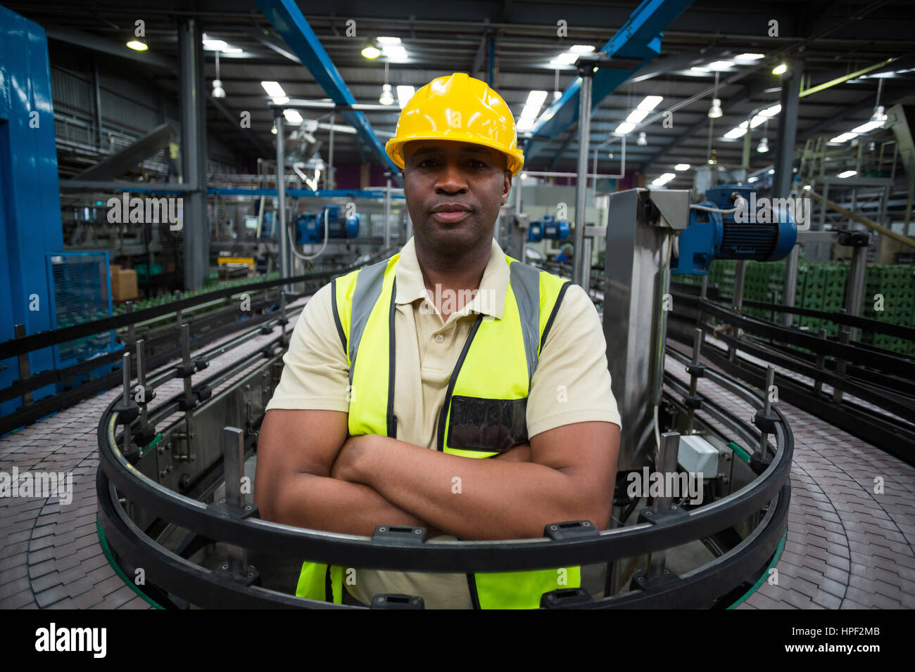 Worker at the conveyor hi-res stock photography and images - Alamy