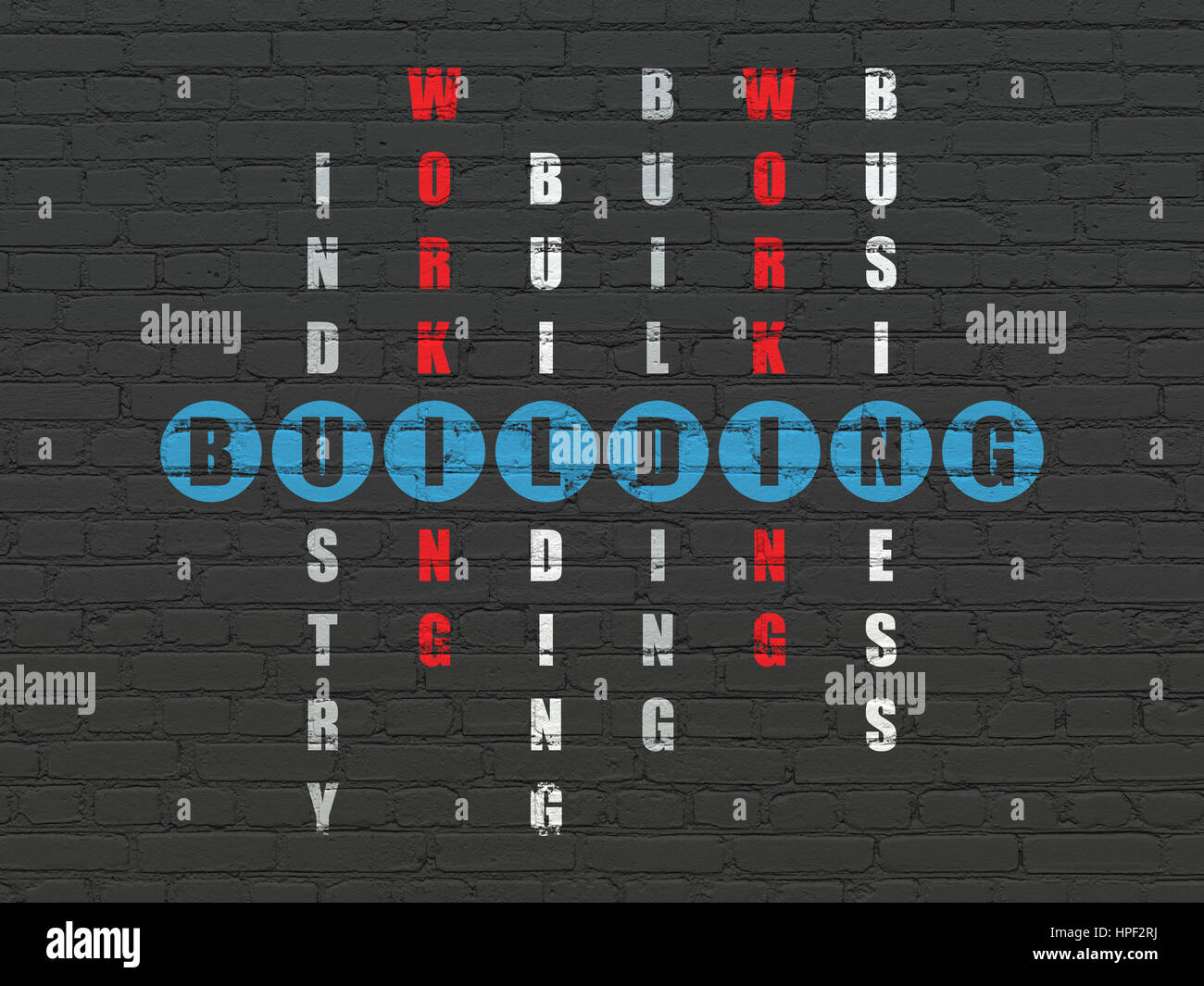 Construction concept: Painted blue word Building in solving Crossword ...