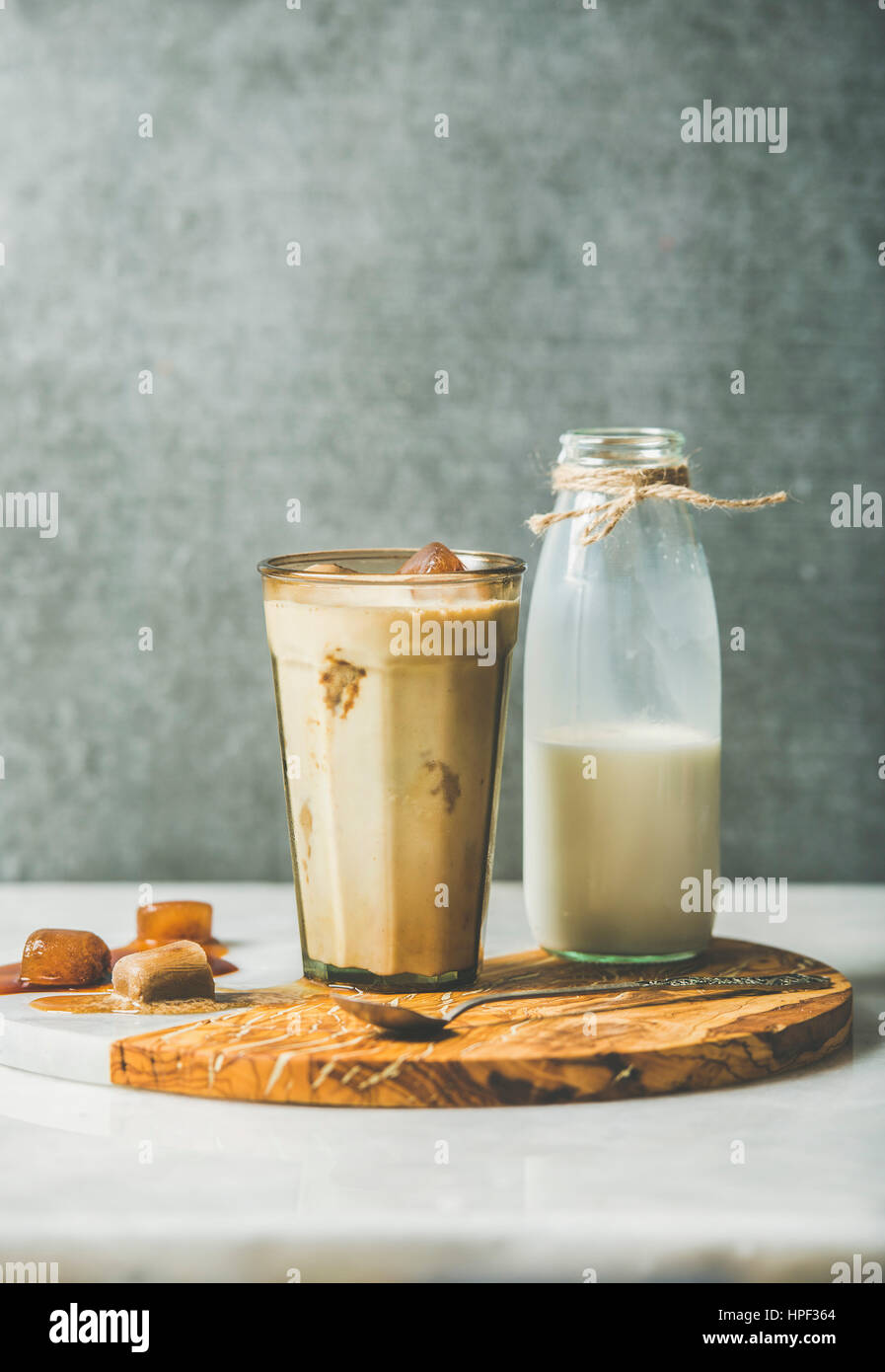 Iced caramel latte summer coffee cocktail with milk and frozen coffee ...