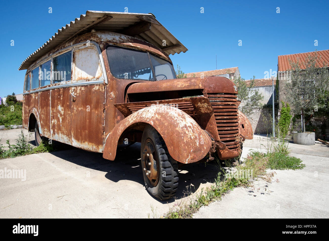 Rusting vintage TAM Pionir bus with corrogated asbestos roof Stock ...