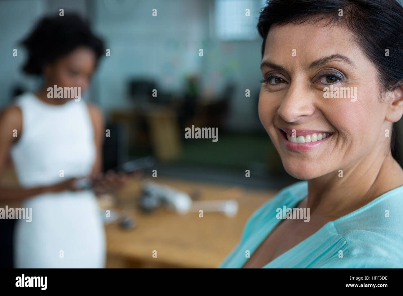 Portrait of beautiful female graphic designer smiling Stock Photo - Alamy