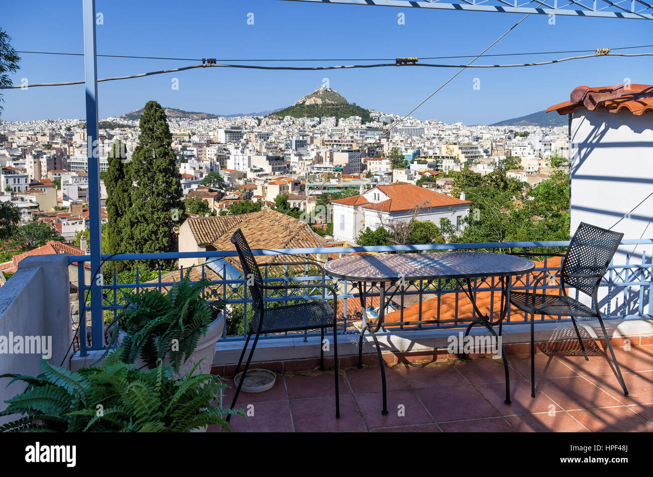 View to Athens city from a balcony in Anafiotika neighborhood, Plaka ...