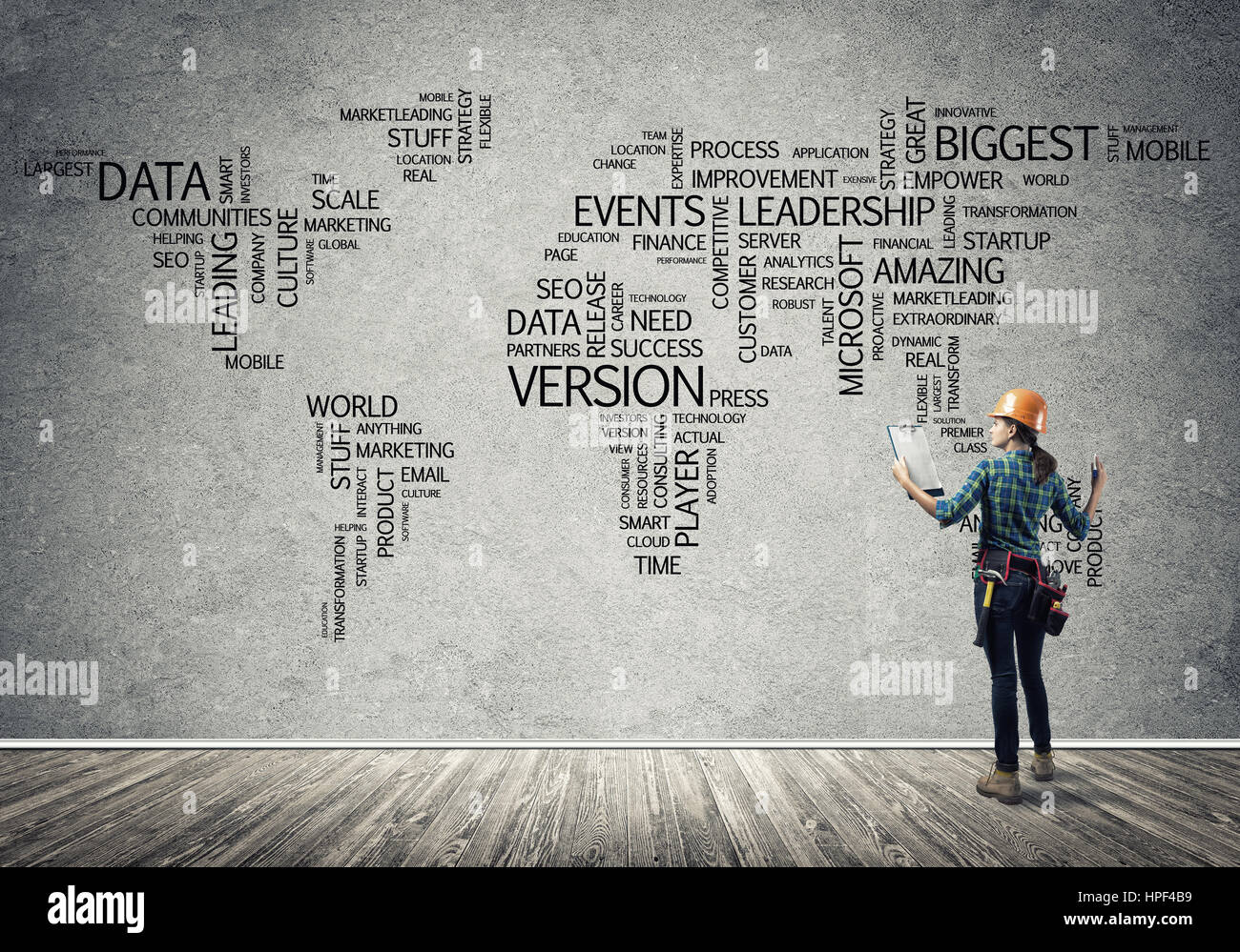 Female construction worker in room and globalization concept Stock ...