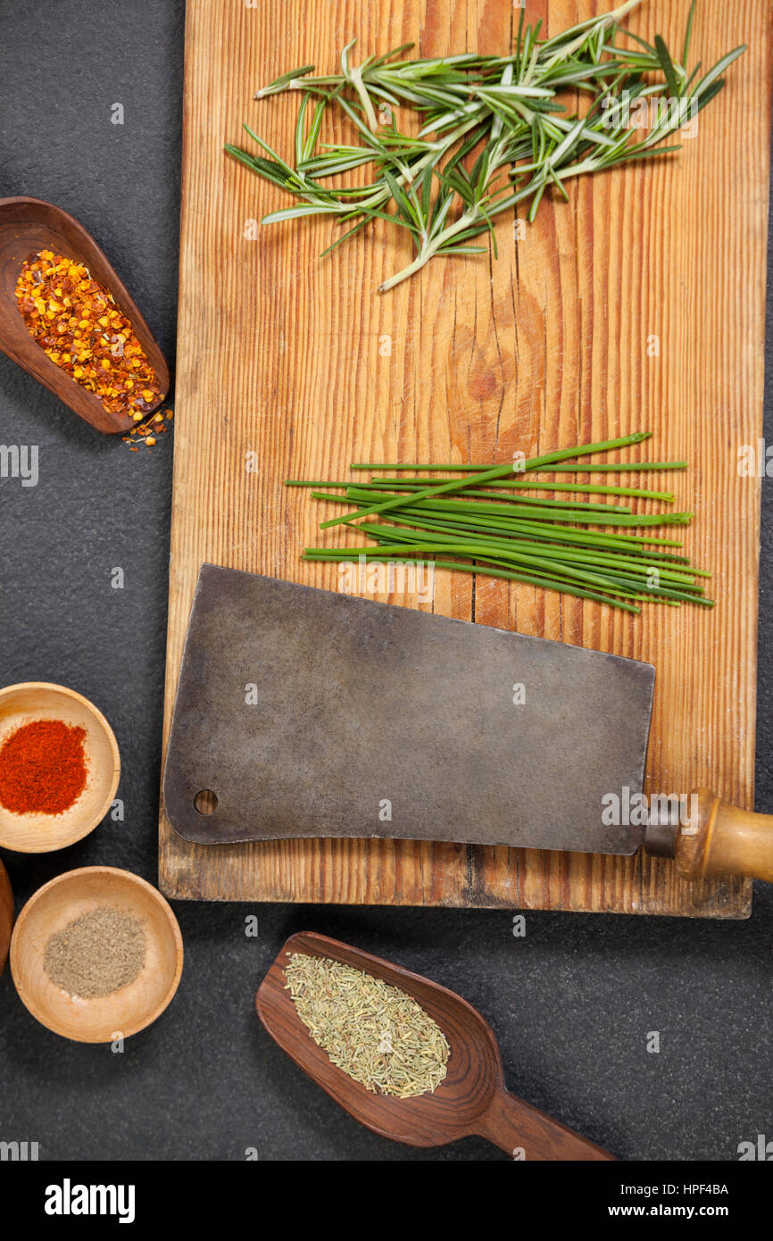 Wooden tray with ingredients against black background Stock Photo - Alamy