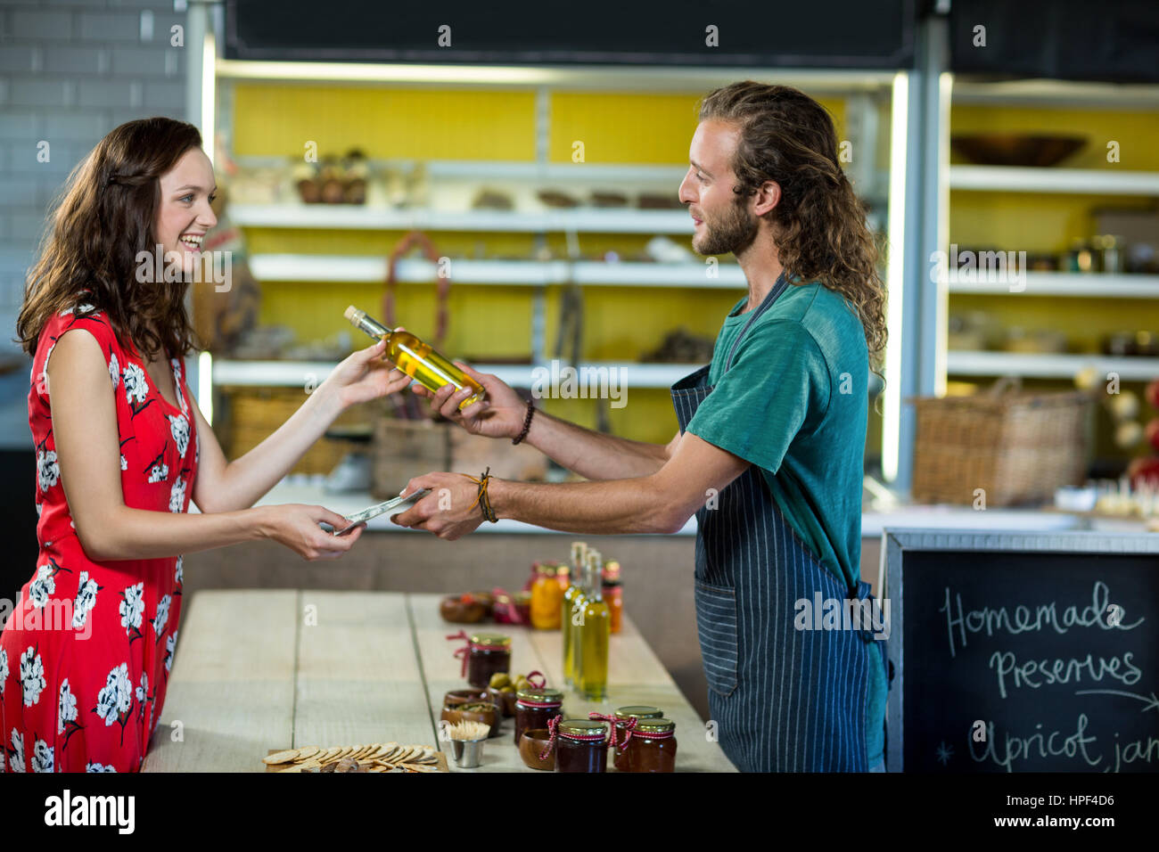 Male shop assistant customer hi-res stock photography and images - Alamy