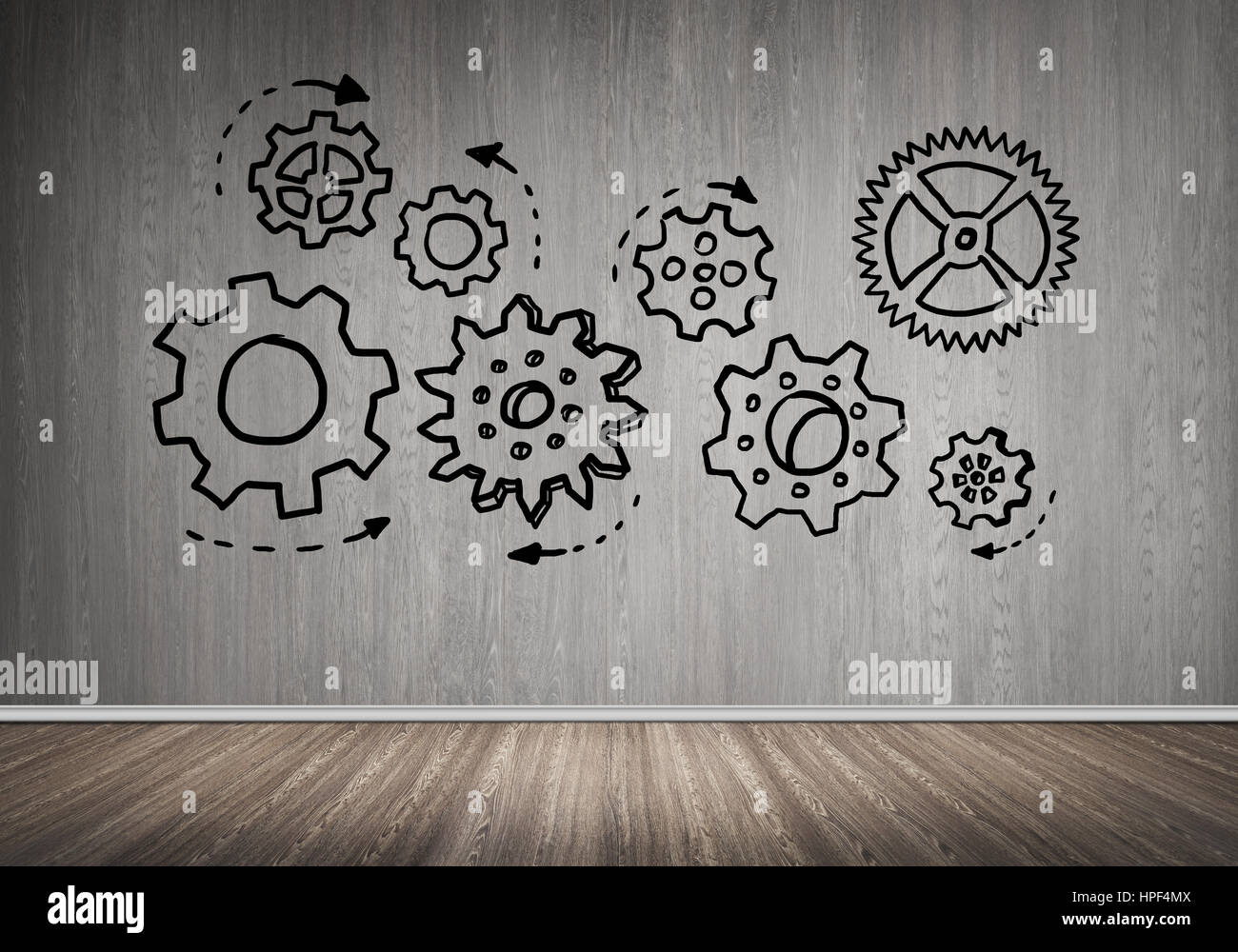 Gear hand drawn mechanism on gray wall Stock Photo - Alamy
