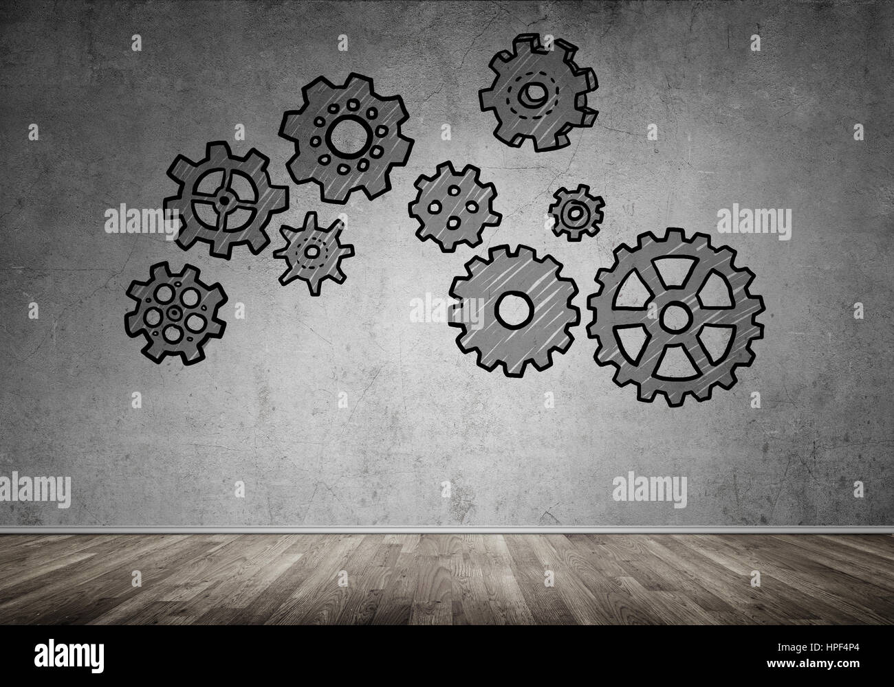 Gear hand drawn mechanism on gray wall Stock Photo - Alamy