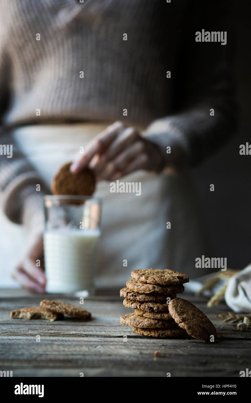 Woman biscuit home hi-res stock photography and images - Alamy