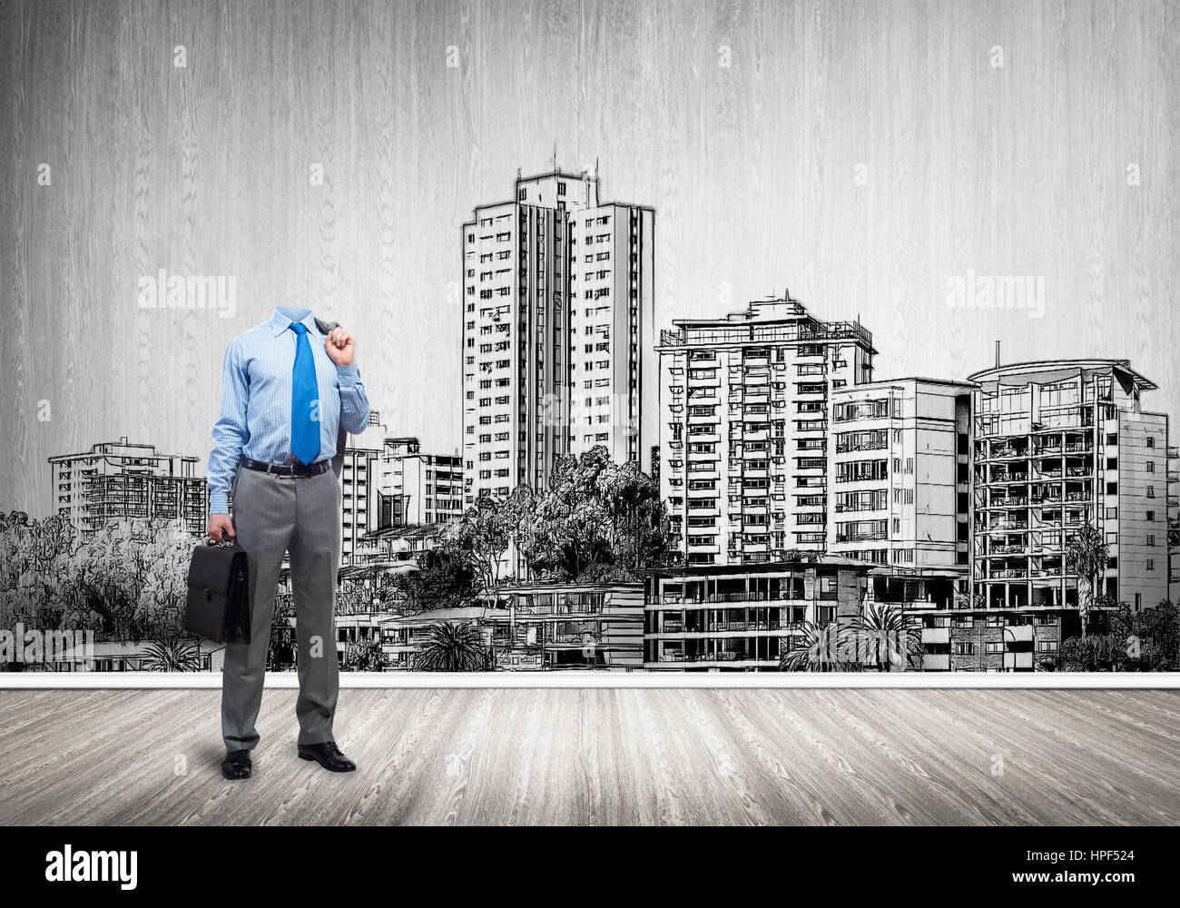 Headless engineer man with papers in hand against construction ...