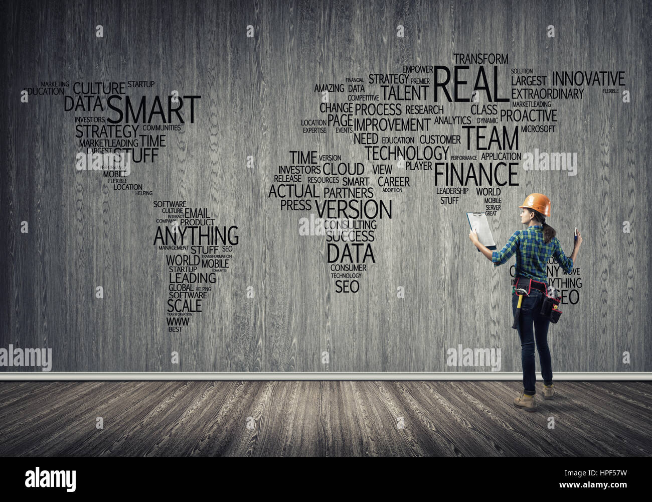 Female construction worker in room and globalization concept Stock ...