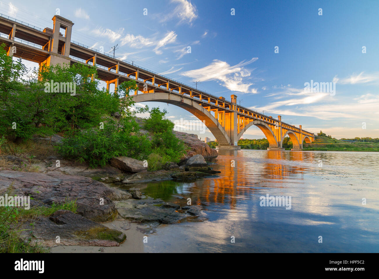 View of concrete arched Preobrazhensky bridge from Khortytsia island on ...