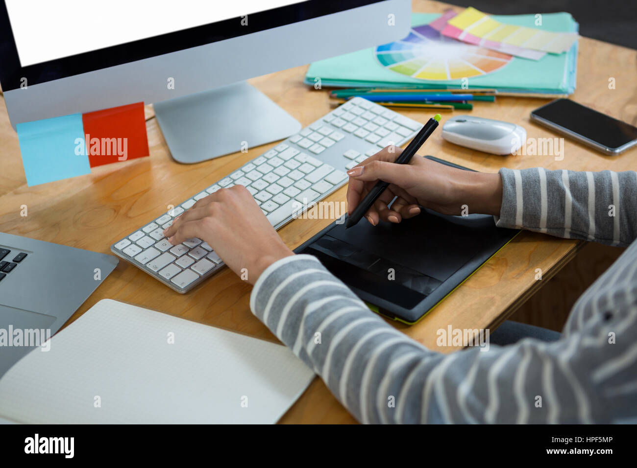 Close up female designer working hi-res stock photography and images ...